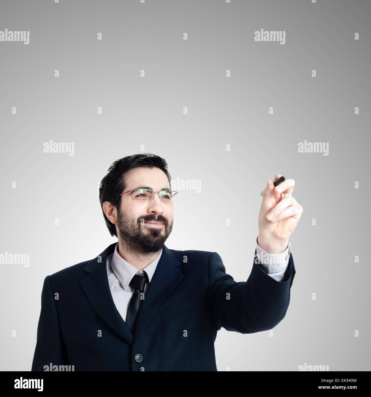 business man writing on imaginary screen Stock Photo - Alamy