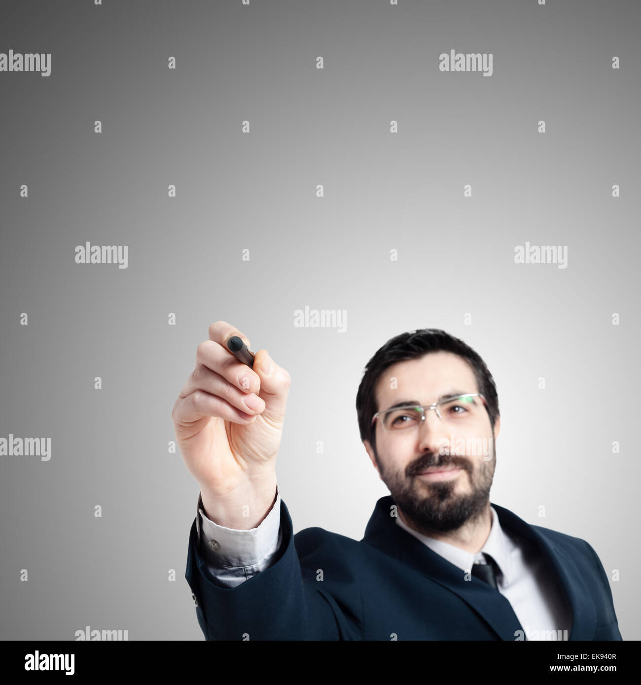 business man writing on imaginary screen Stock Photo - Alamy