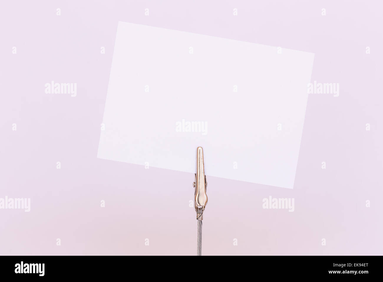 sheet of paper for notes and paper clip Stock Photo - Alamy