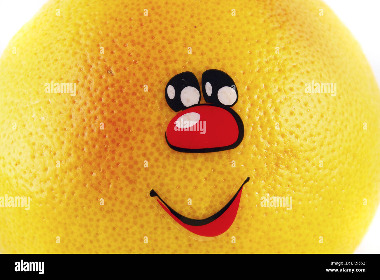 grapefruit face isolated on white Stock Photo - Alamy