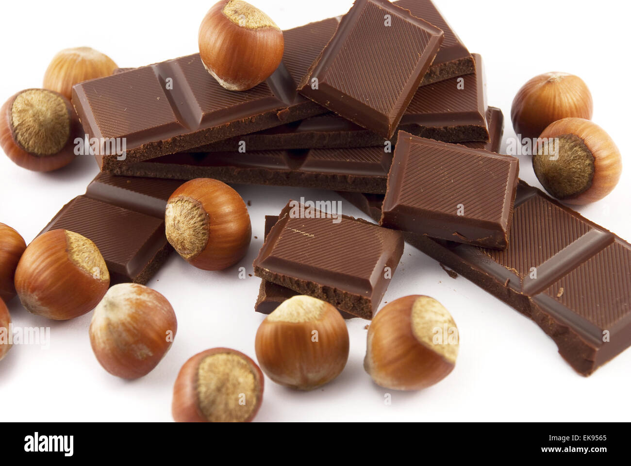 nuts and chocolate isolated on white Stock Photo - Alamy