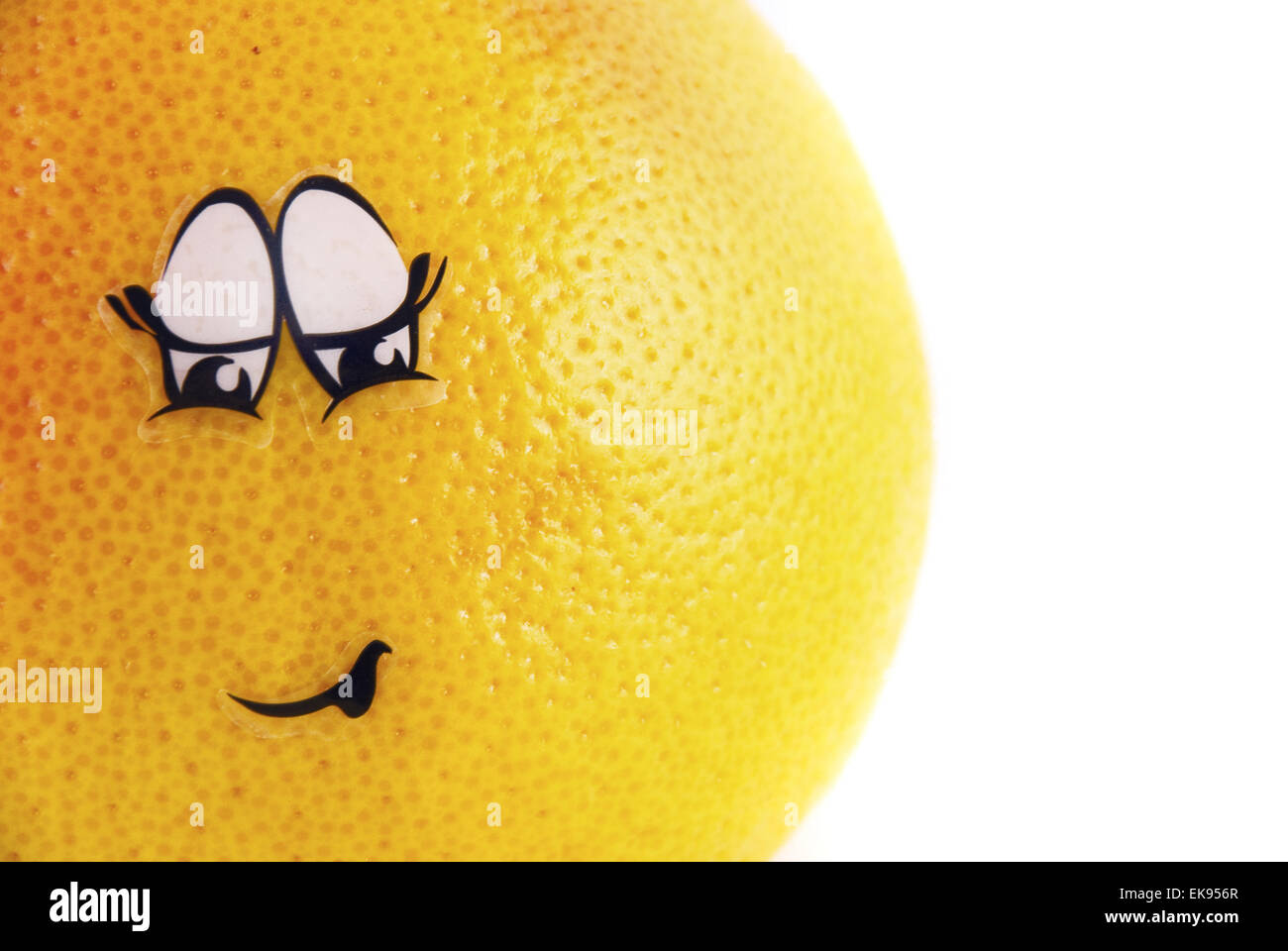grapefruit face isolated on white Stock Photo - Alamy