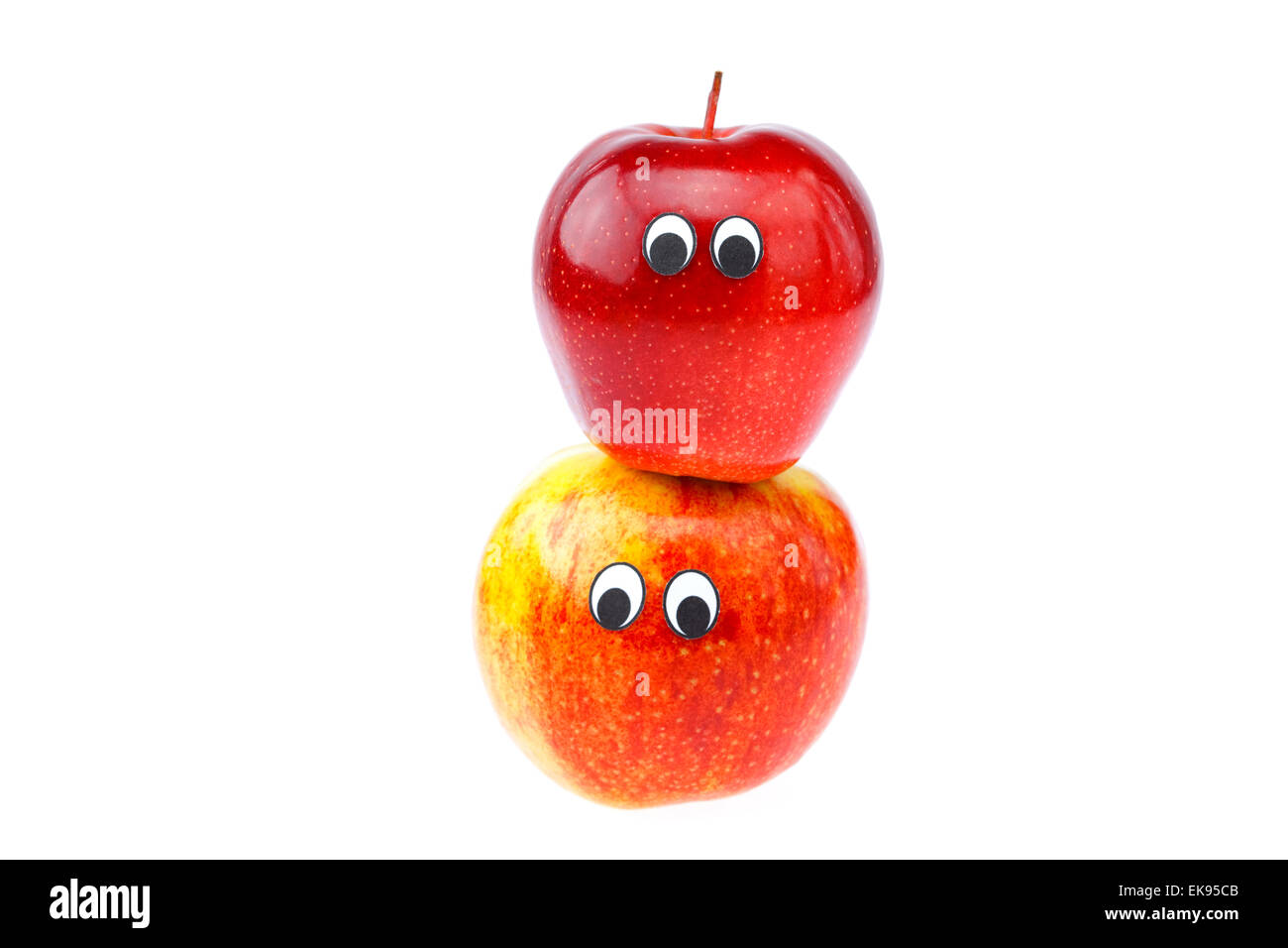 apples with eyes and faces isolated on white Stock Photo - Alamy