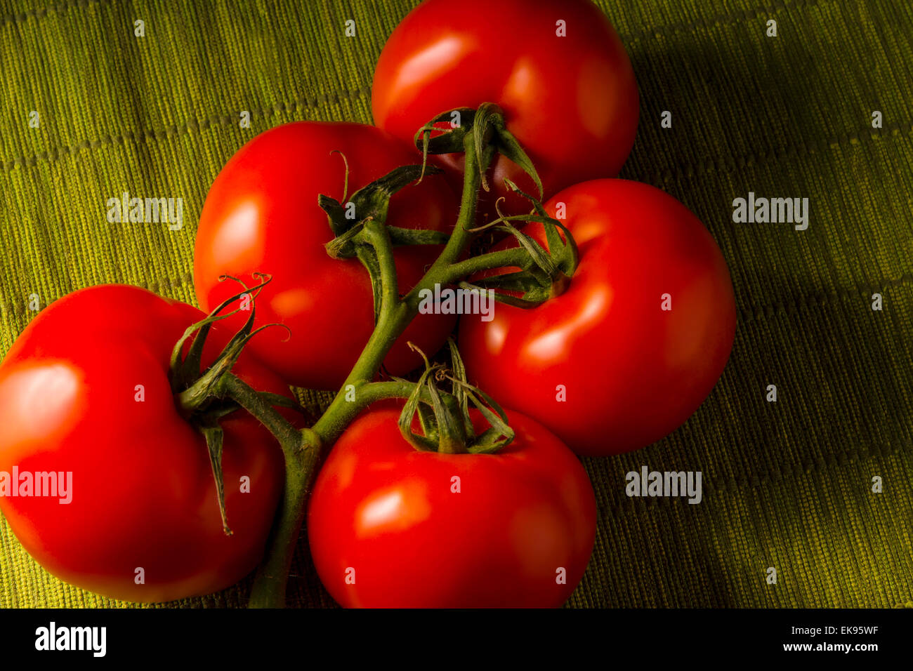 Close up five tomatoes on hi-res stock photography and images - Alamy