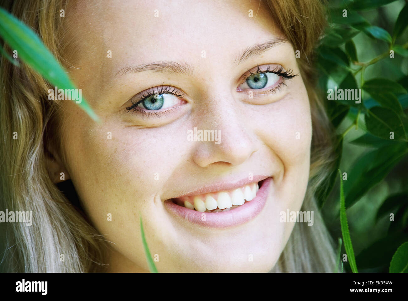 portrait of beautiful young women in nature Stock Photo - Alamy