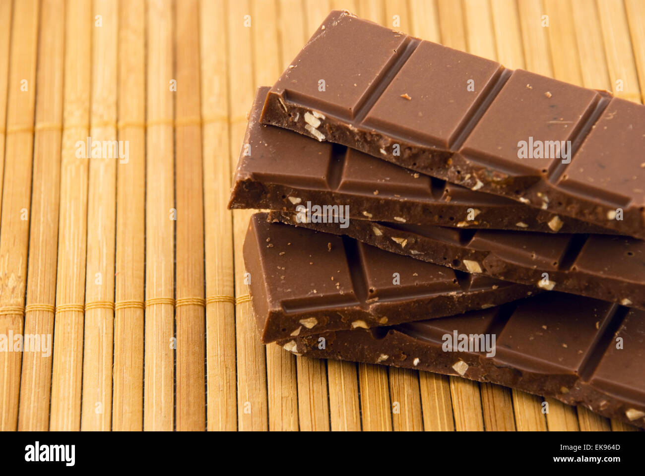 chocolate bars on a bamboo mat Stock Photo - Alamy