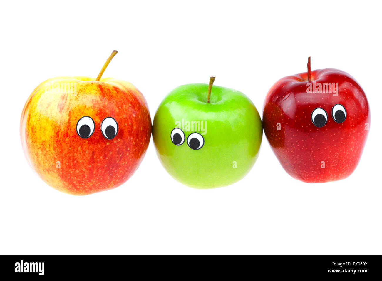 apples with eyes and faces isolated on white Stock Photo - Alamy