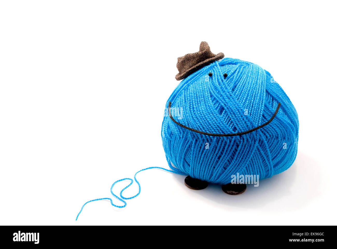 Toy of the tangle of threads with eyes isolated on white Stock Photo ...