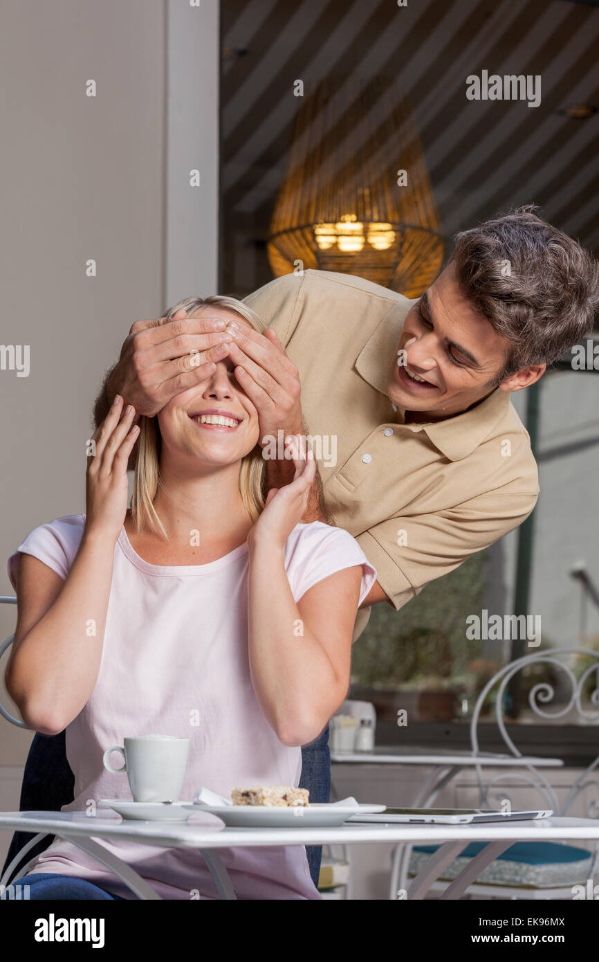 Couple in love drinking a coffee Stock Photo - Alamy