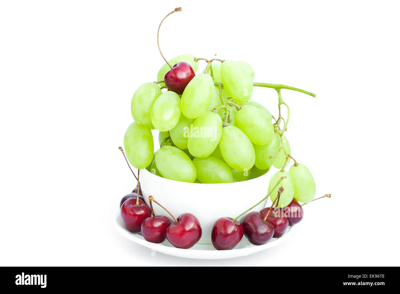 grapes cherry in the cup is isolated on white Stock Photo - Alamy