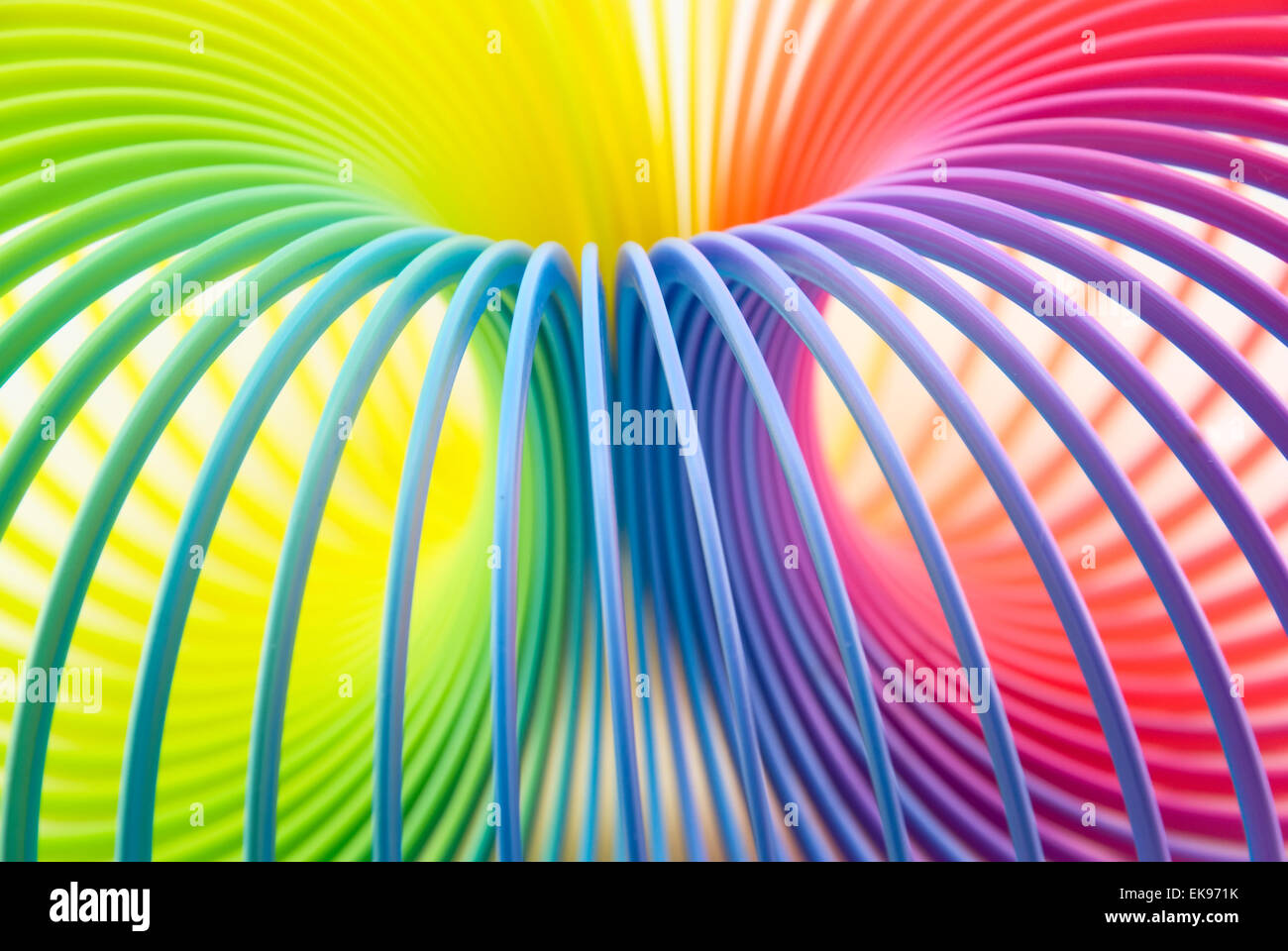 Colorful toy spring Stock Photo - Alamy