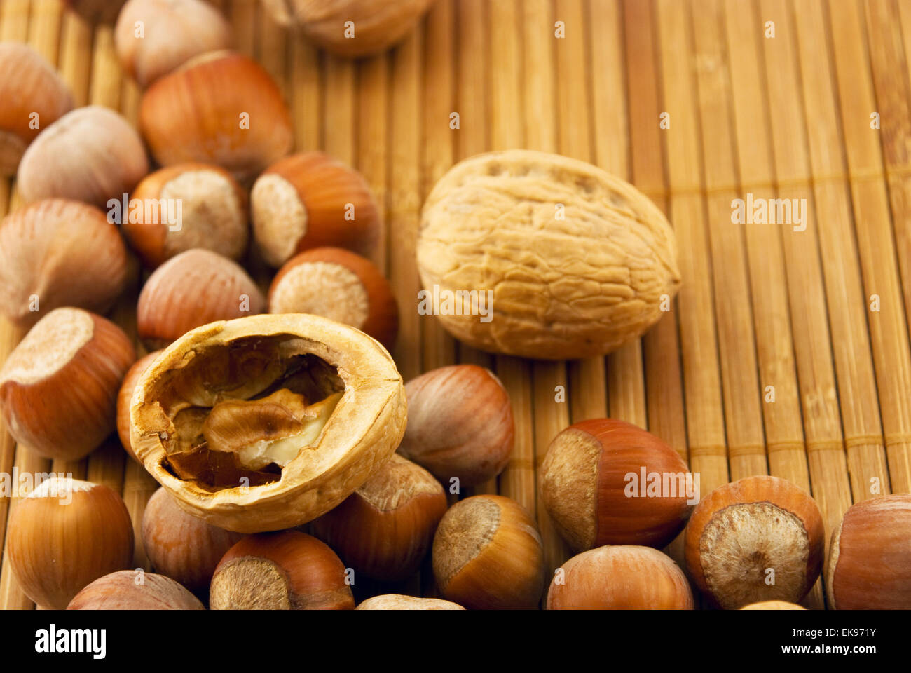 nuts on a bamboo mat Stock Photo - Alamy