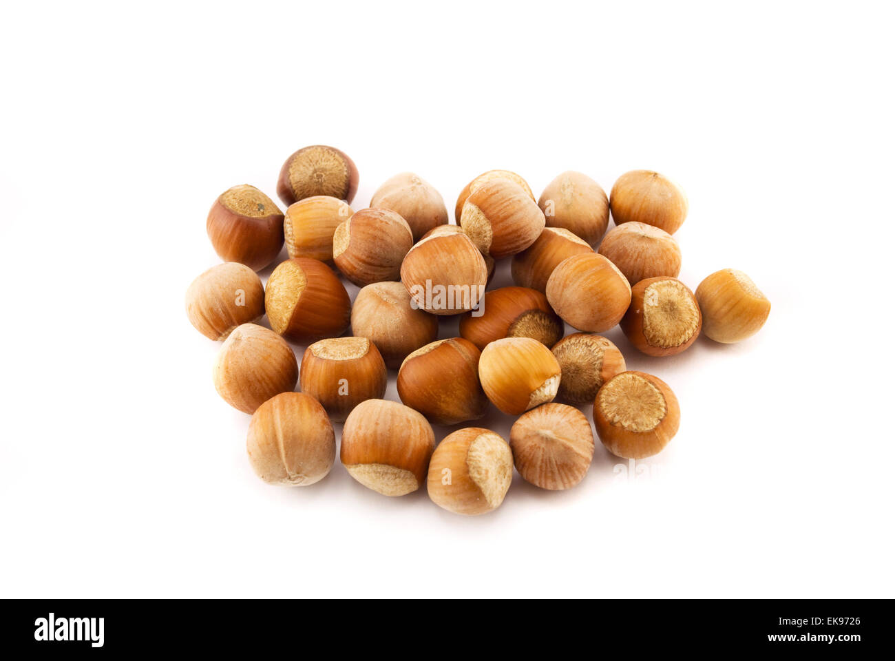 hazelnuts isolated on white Stock Photo - Alamy