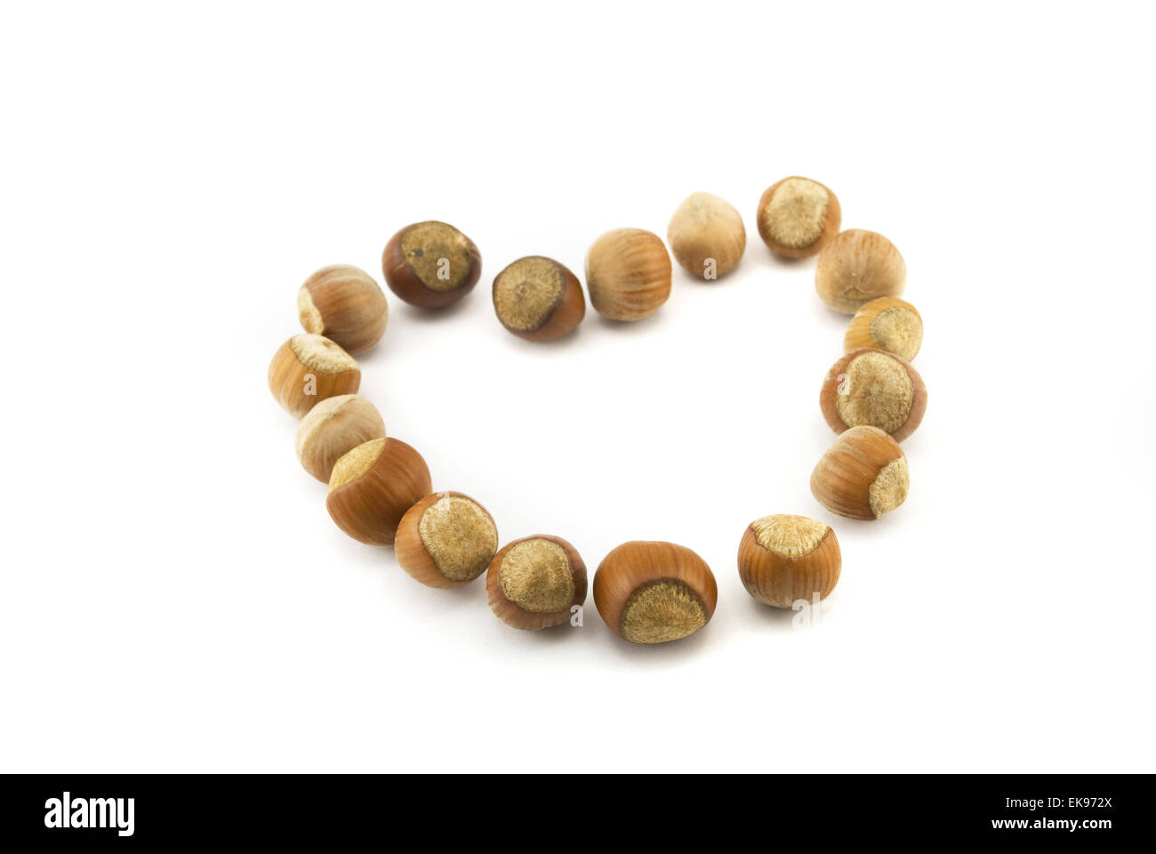 hazelnuts isolated on white Stock Photo - Alamy