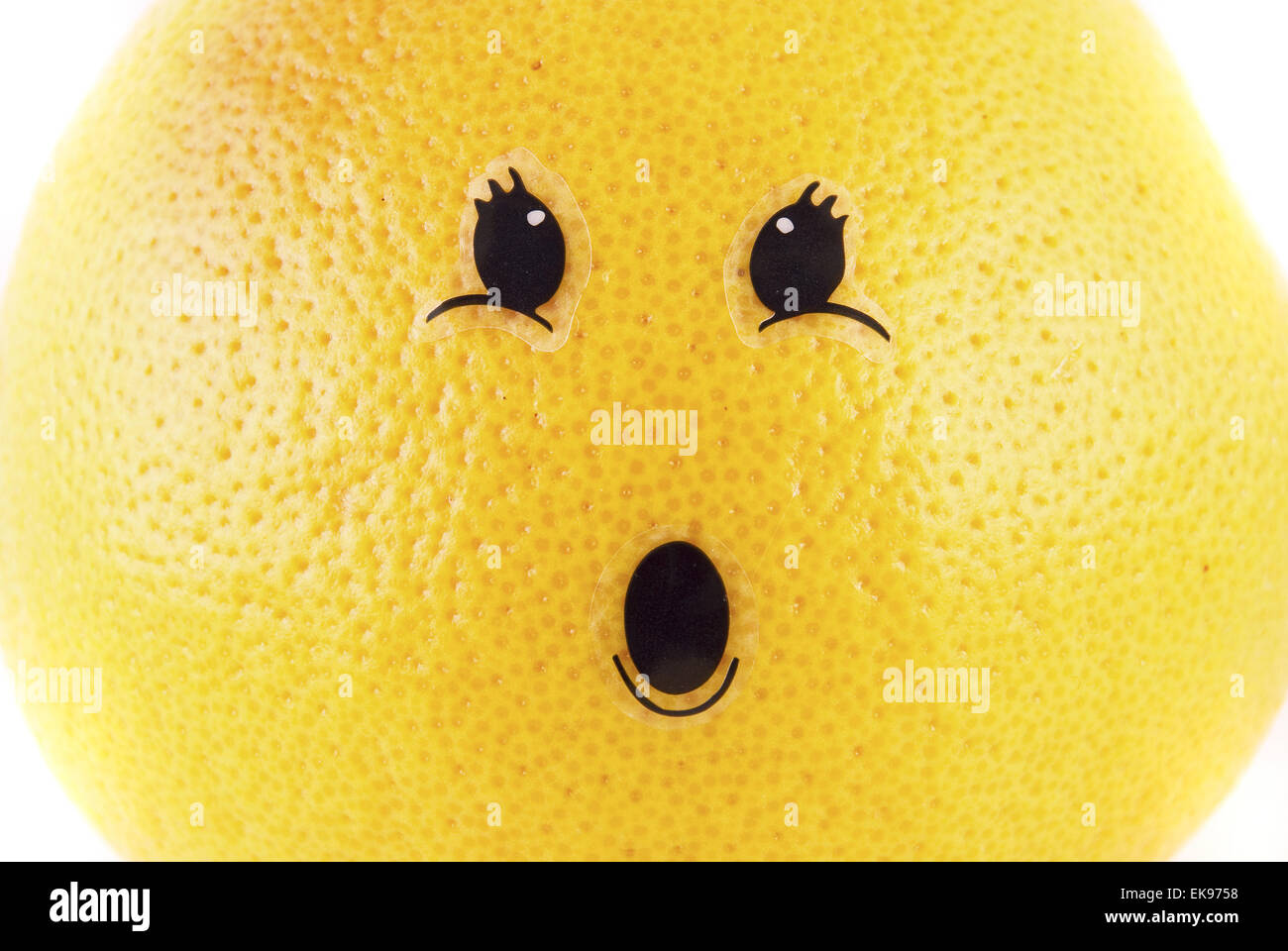 grapefruit face isolated on white Stock Photo - Alamy