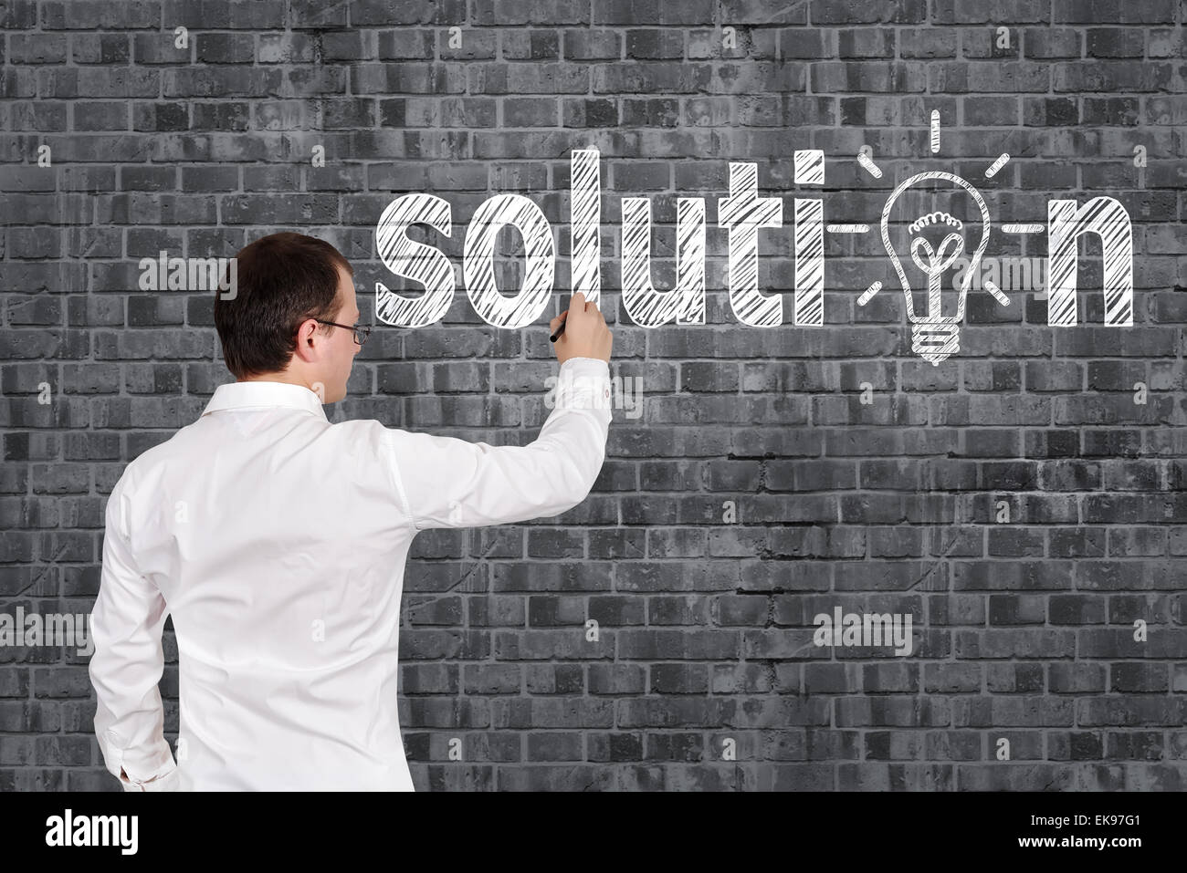 drawing solution symbol on wall Stock Photo - Alamy