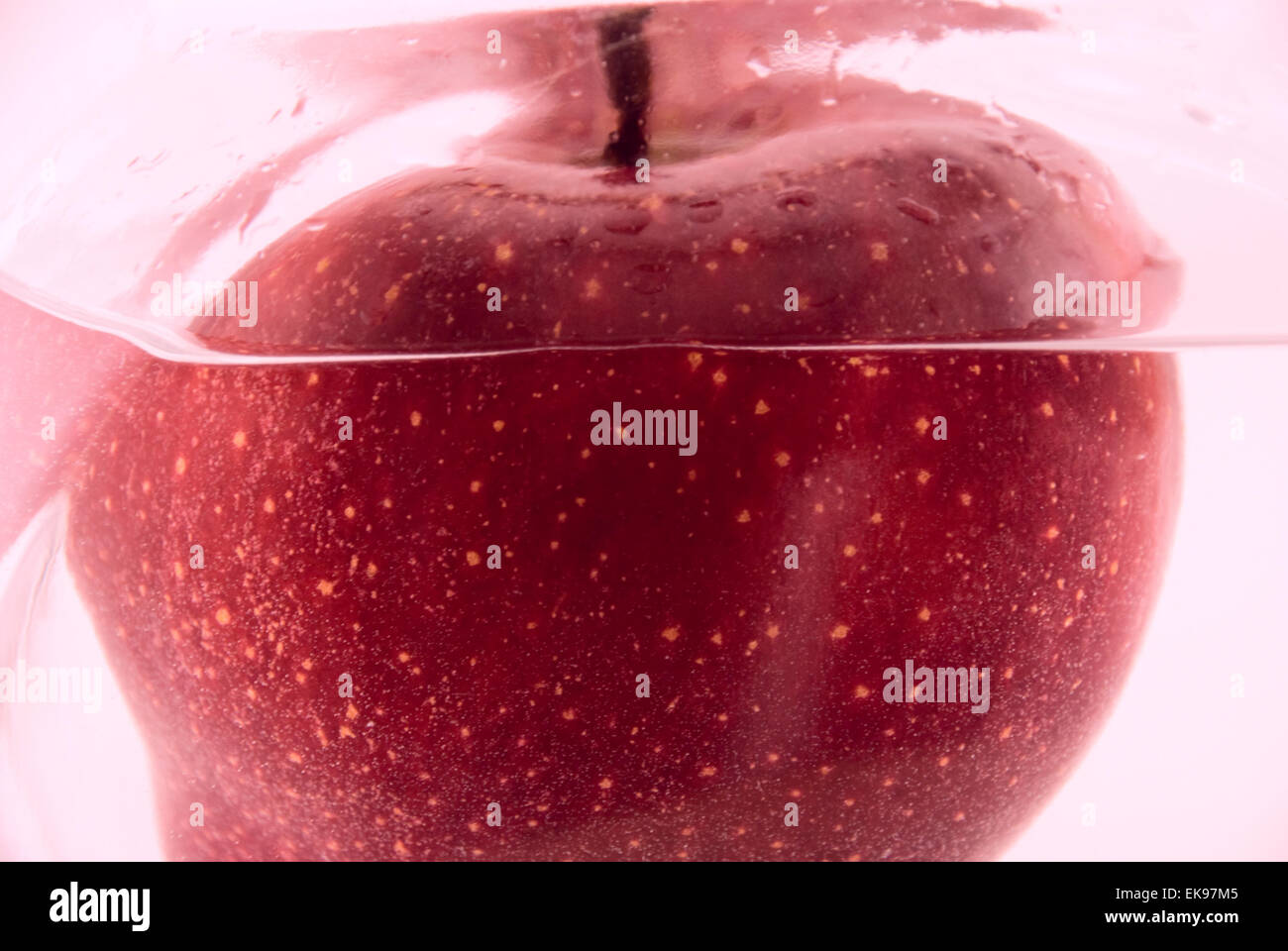 red apple in the water Stock Photo - Alamy
