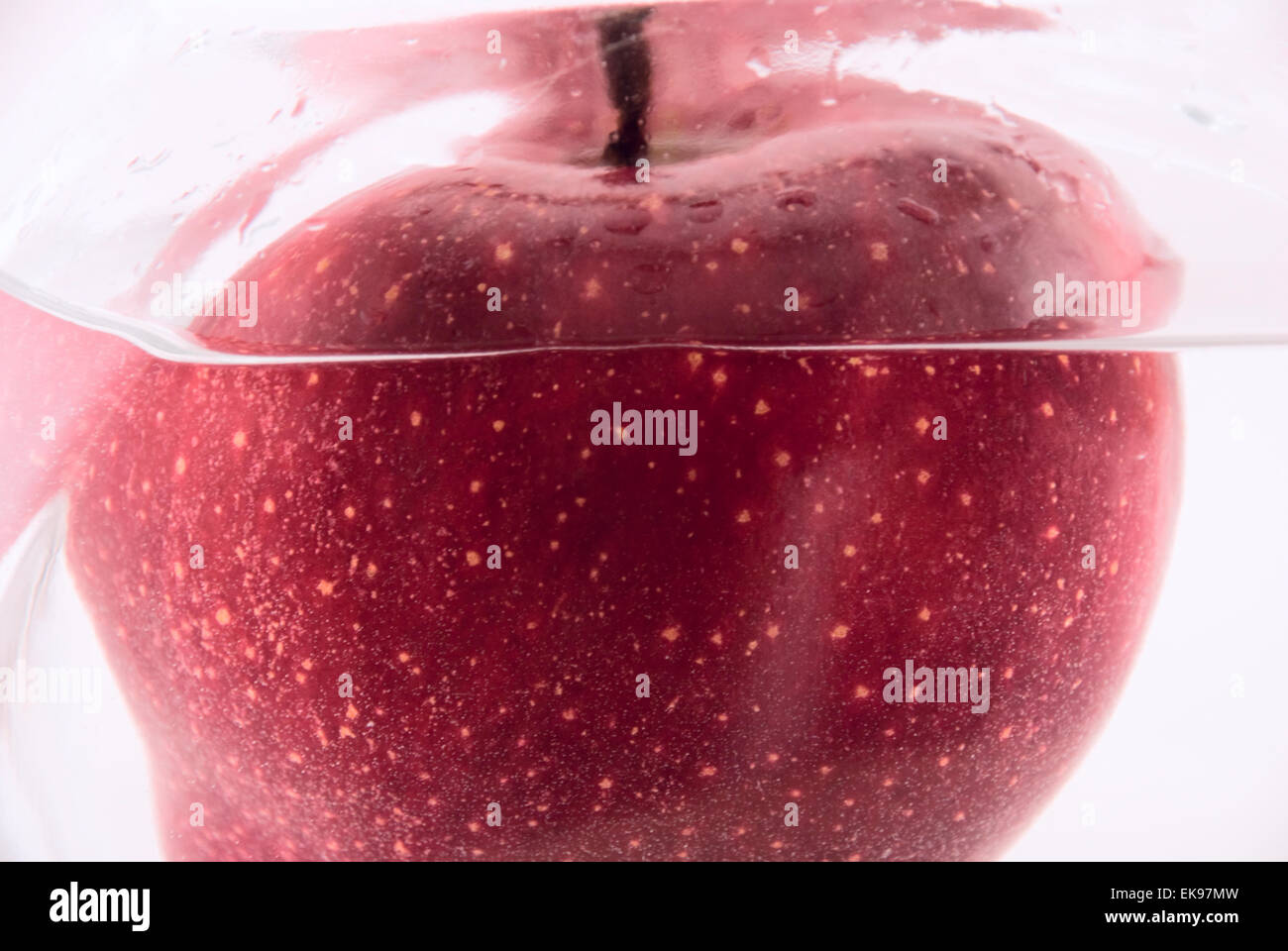 red apple in the water Stock Photo - Alamy