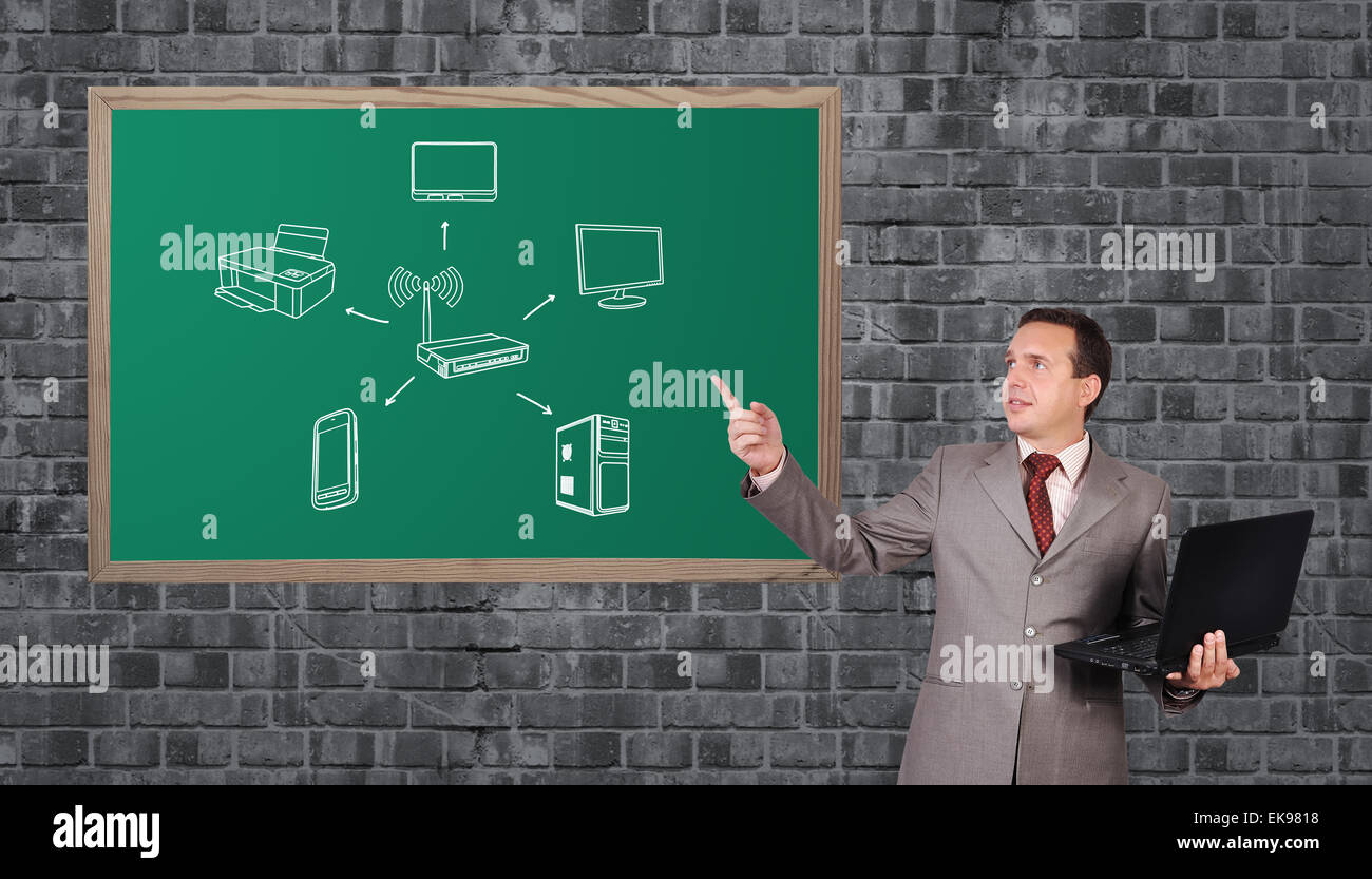 man pointing to computer network Stock Photo - Alamy