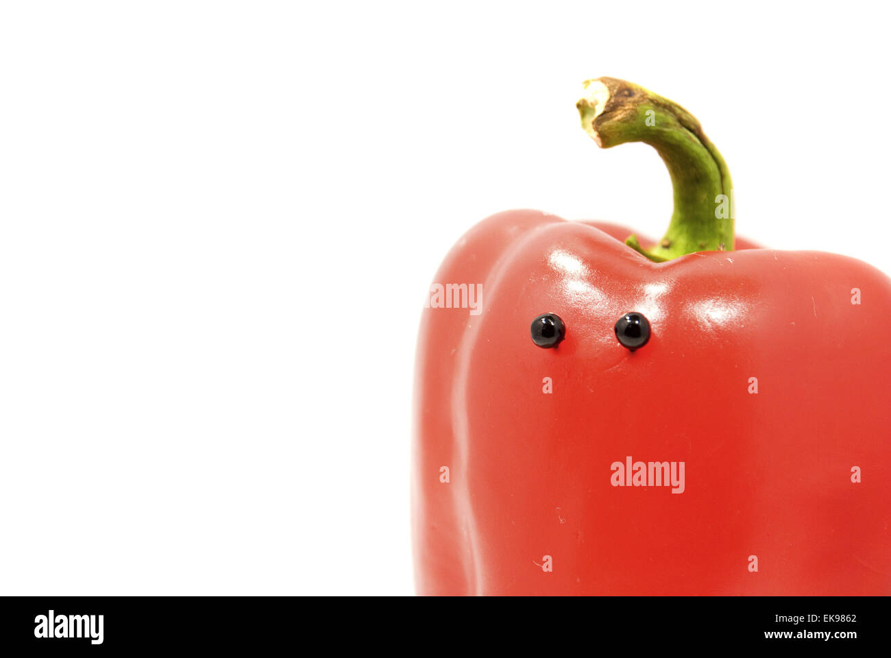 pepper with eyes isolated on white Stock Photo - Alamy