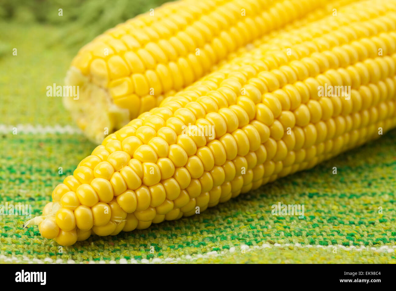 Corn lying on the mat Stock Photo - Alamy
