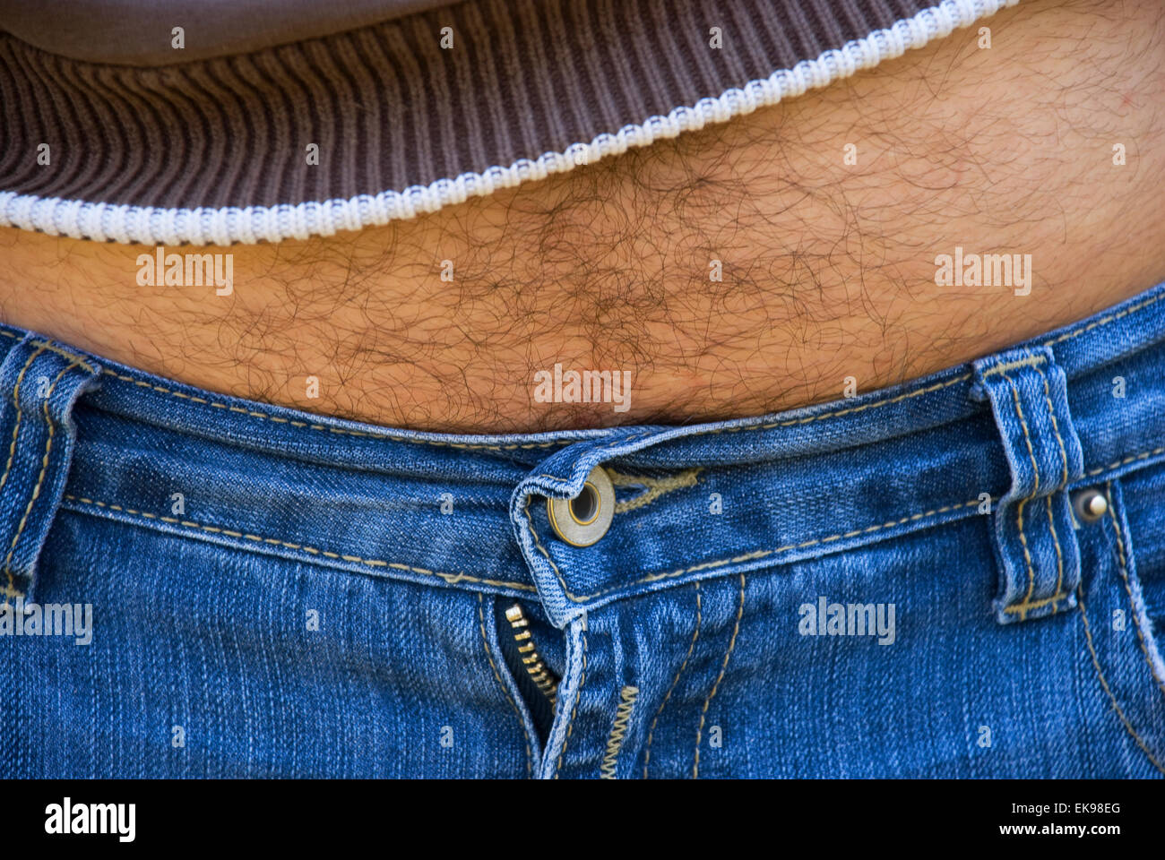 Male belly button hi-res stock photography and images - Alamy