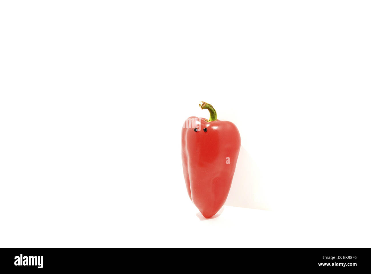 pepper with eyes isolated on white Stock Photo - Alamy