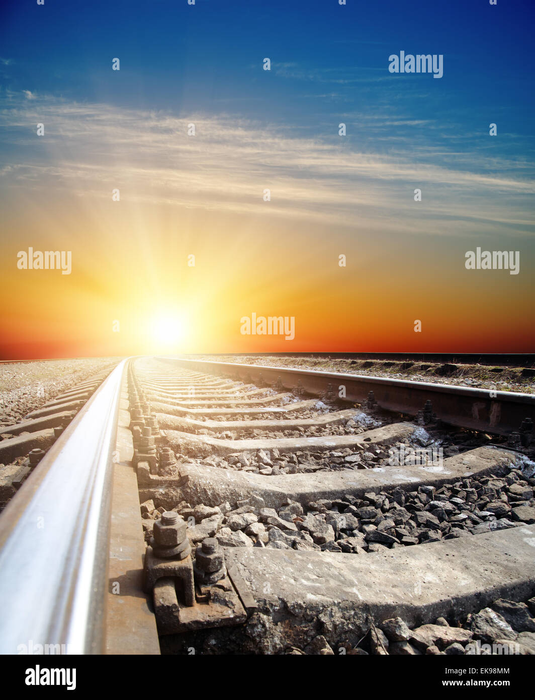 sunset over railroad Stock Photo - Alamy