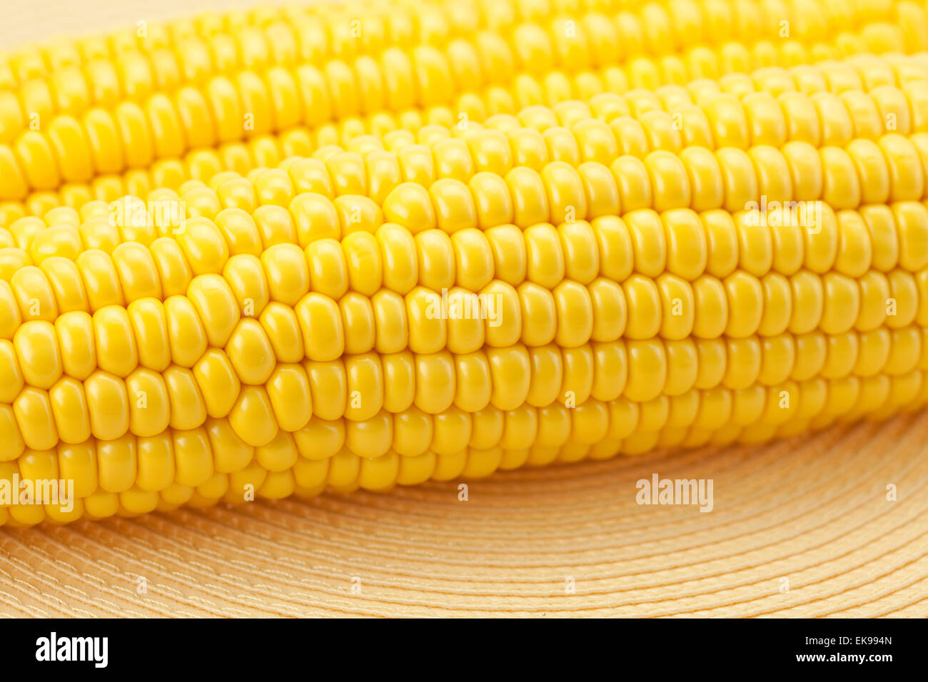 Corn lying on the mat Stock Photo - Alamy