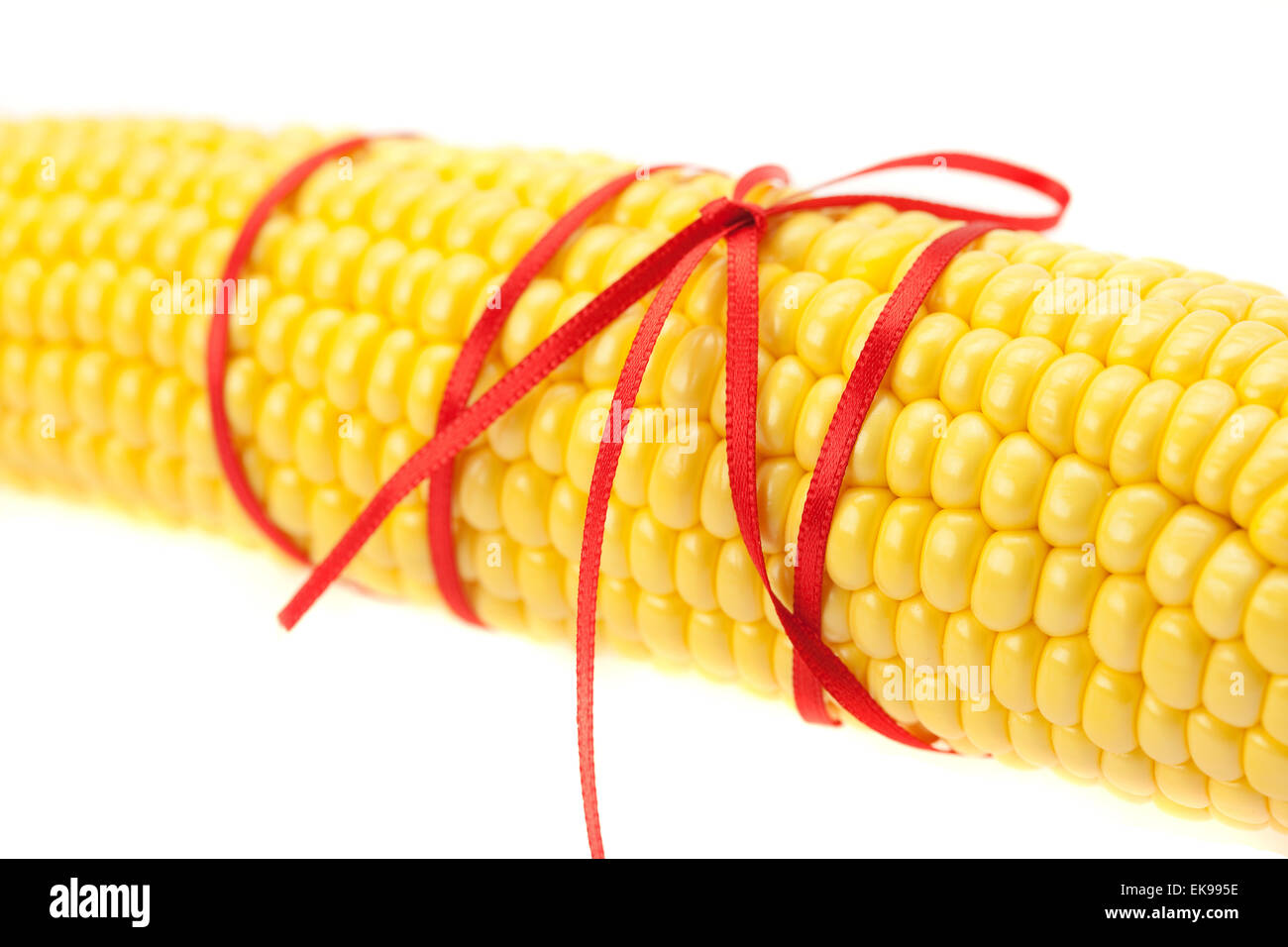 Corn tied with ribbon isolated on white Stock Photo - Alamy