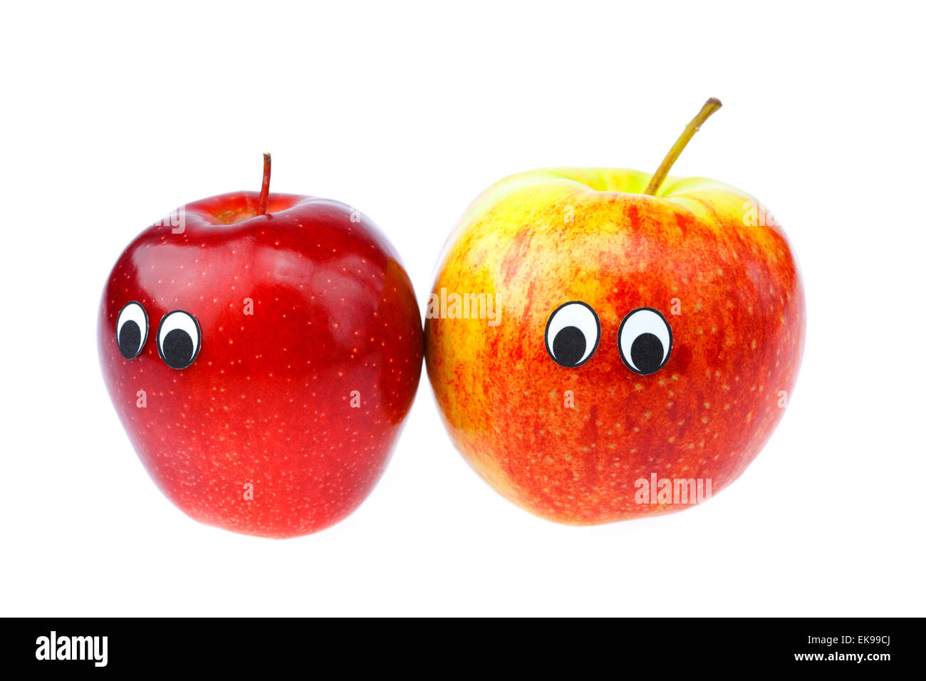 apples with eyes and faces isolated on white Stock Photo - Alamy