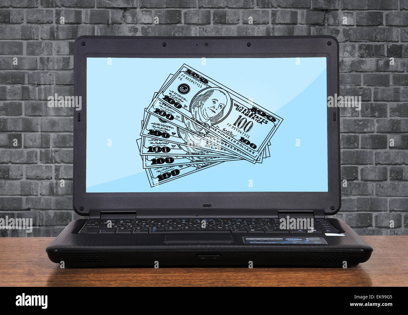 laptop with dollar Stock Photo - Alamy