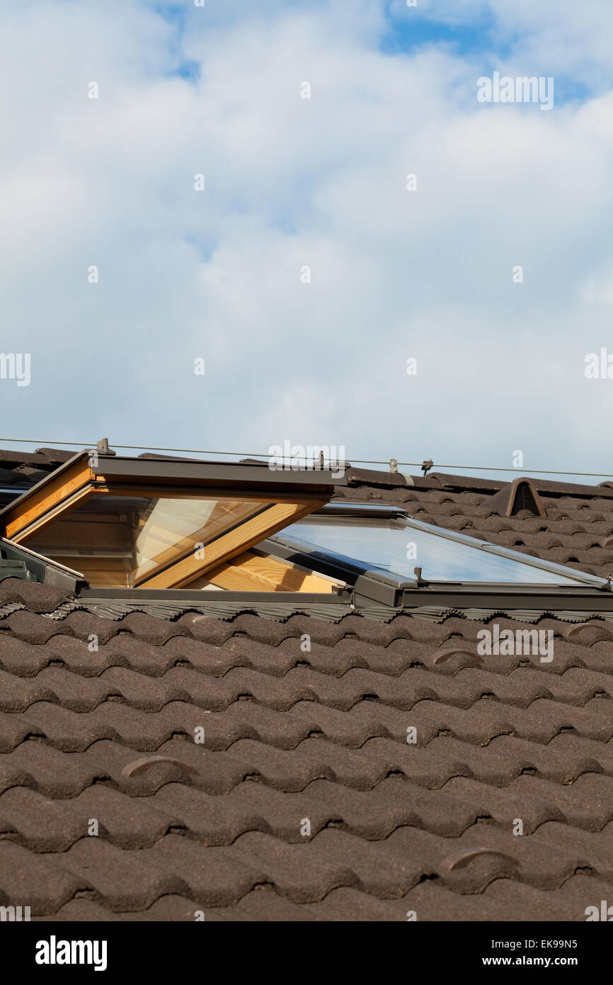 Tiled roof and dormer windows on the skyline Stock Photo - Alamy