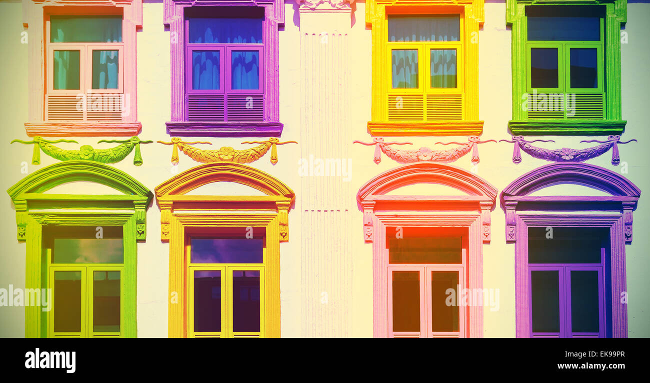 Retro filtered and faded colorful windows and building facade Stock ...