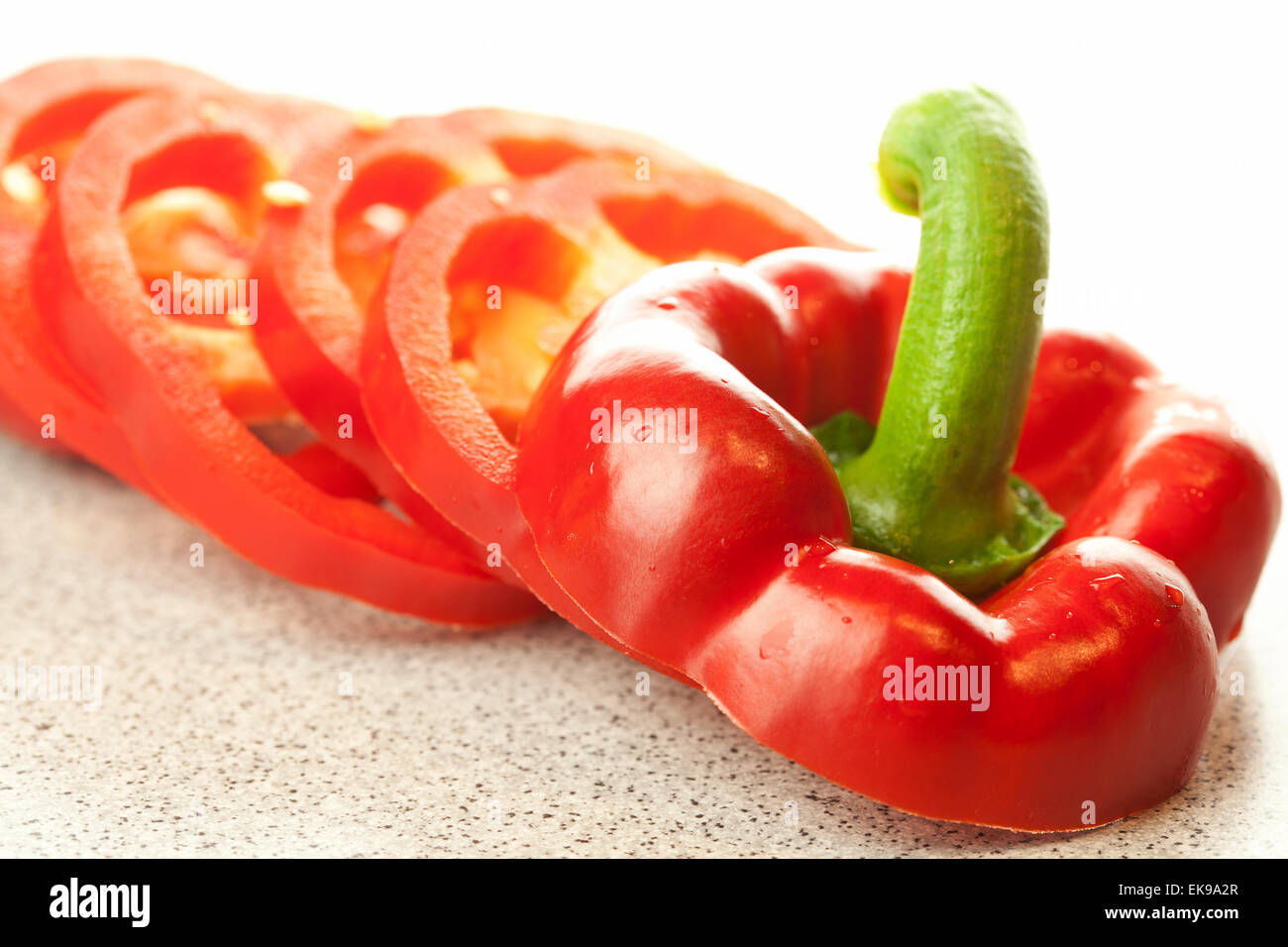 chopped red pepper with drops of water on the table Stock Photo - Alamy