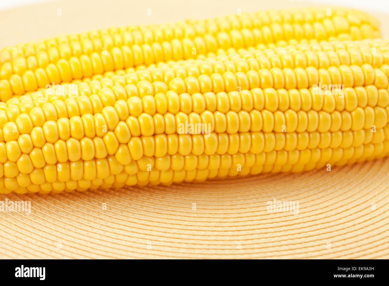 corn lying on a mat Stock Photo - Alamy