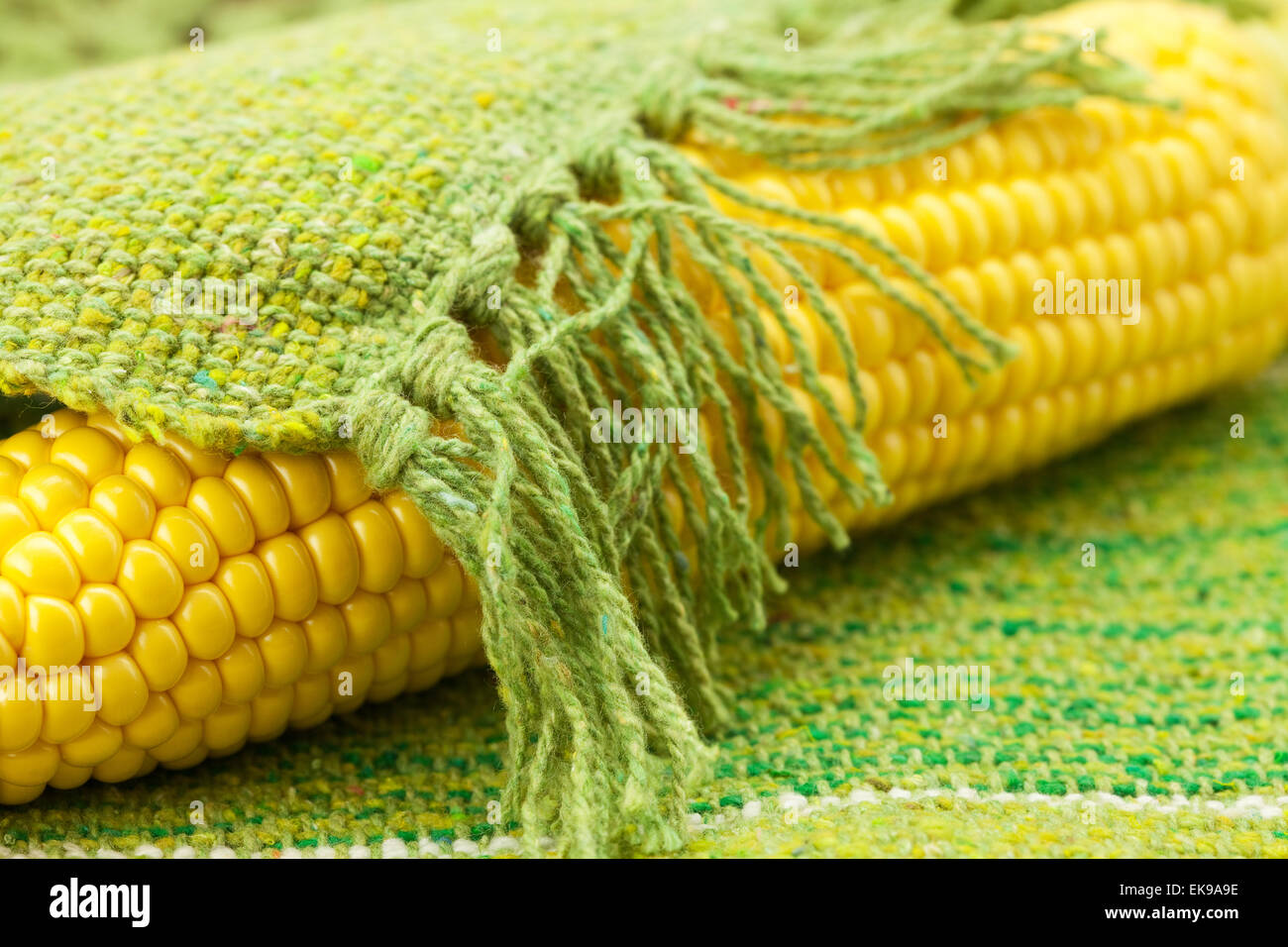 Corn lying on the mat Stock Photo - Alamy