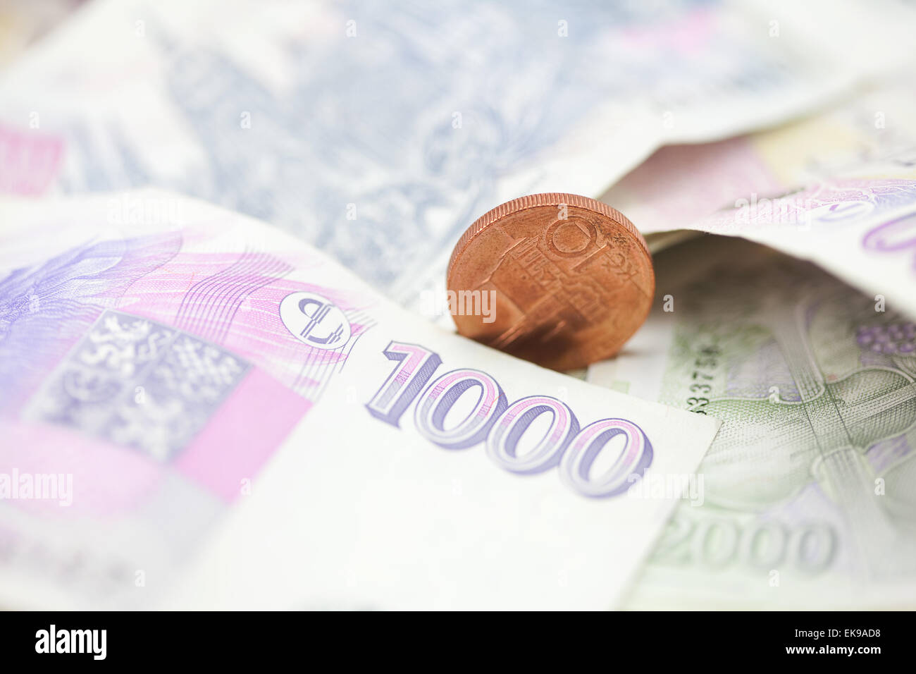 stack of paper money and coins Stock Photo - Alamy