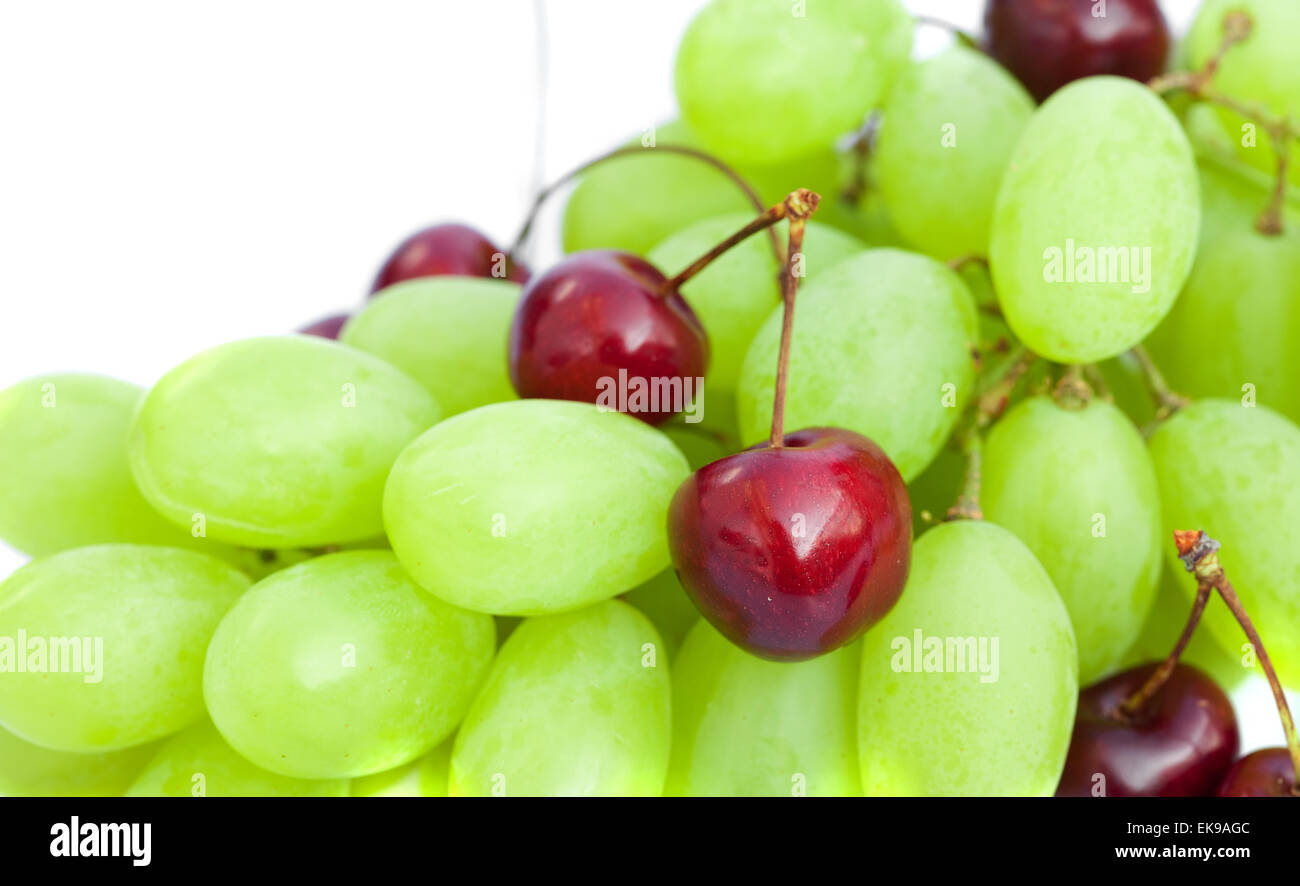 grapes and cherries isolated on white Stock Photo - Alamy