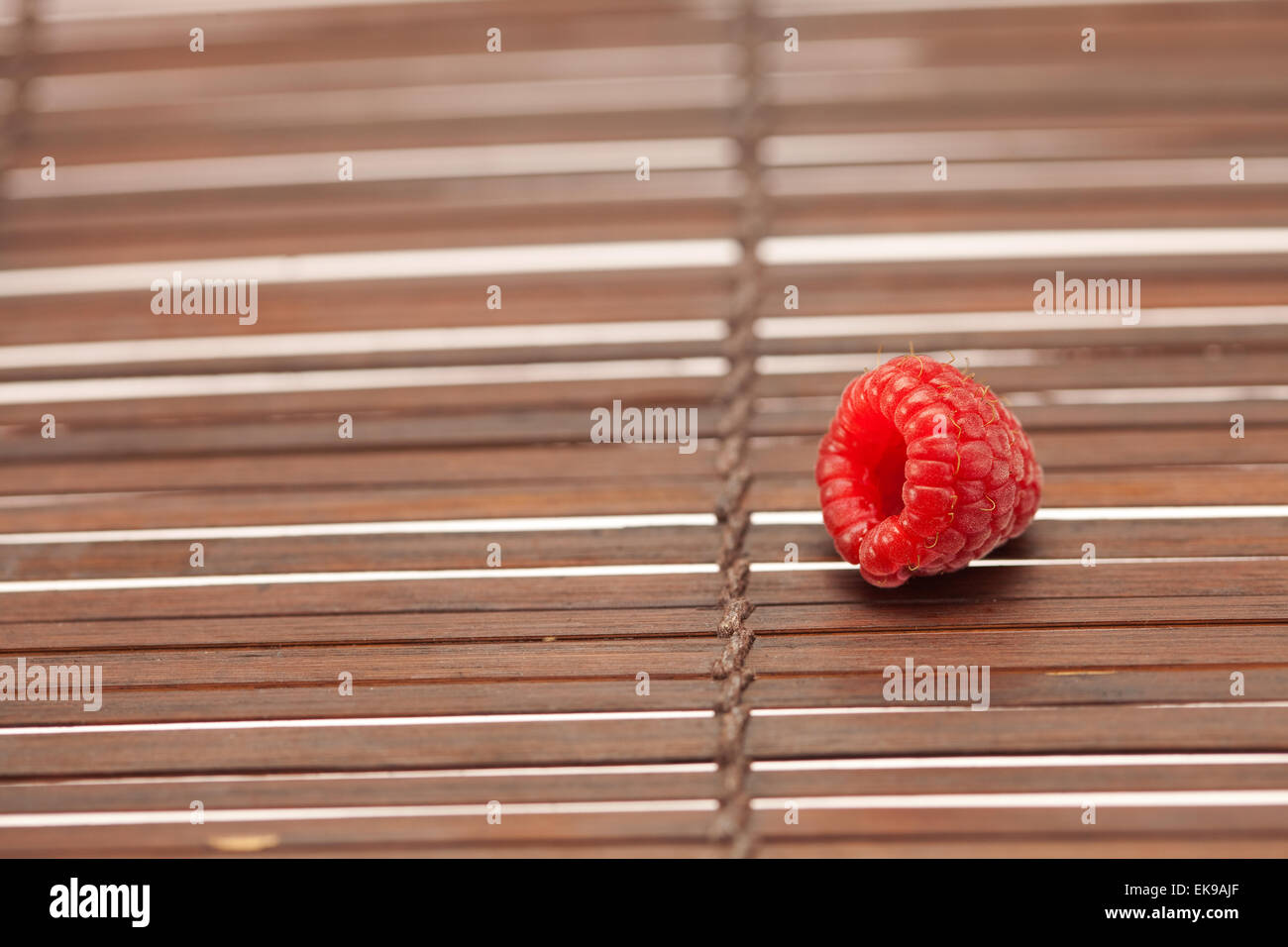 Raspberry on a bamboo mat Stock Photo - Alamy
