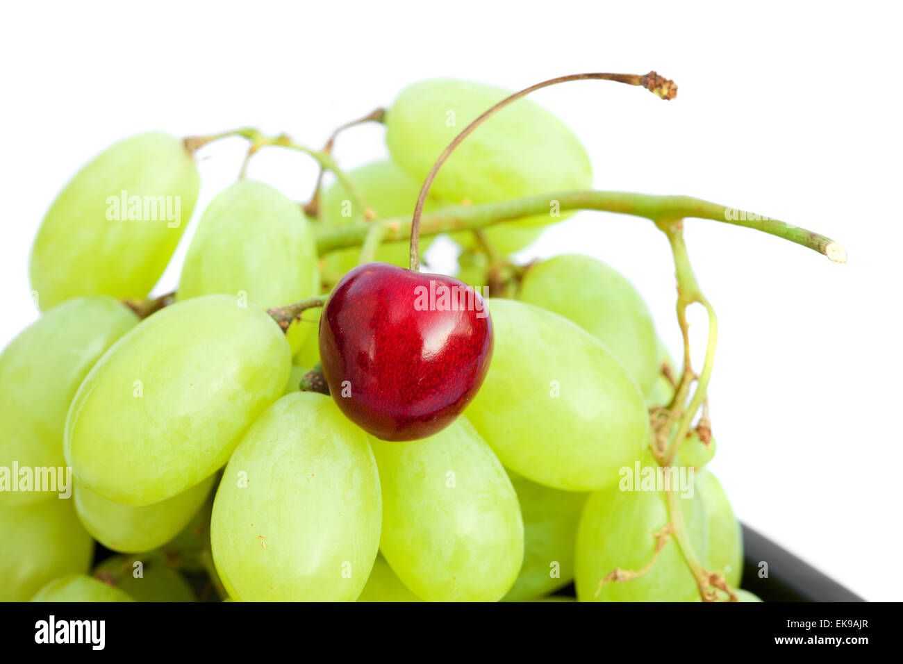 grapes and cherries isolated on white Stock Photo - Alamy