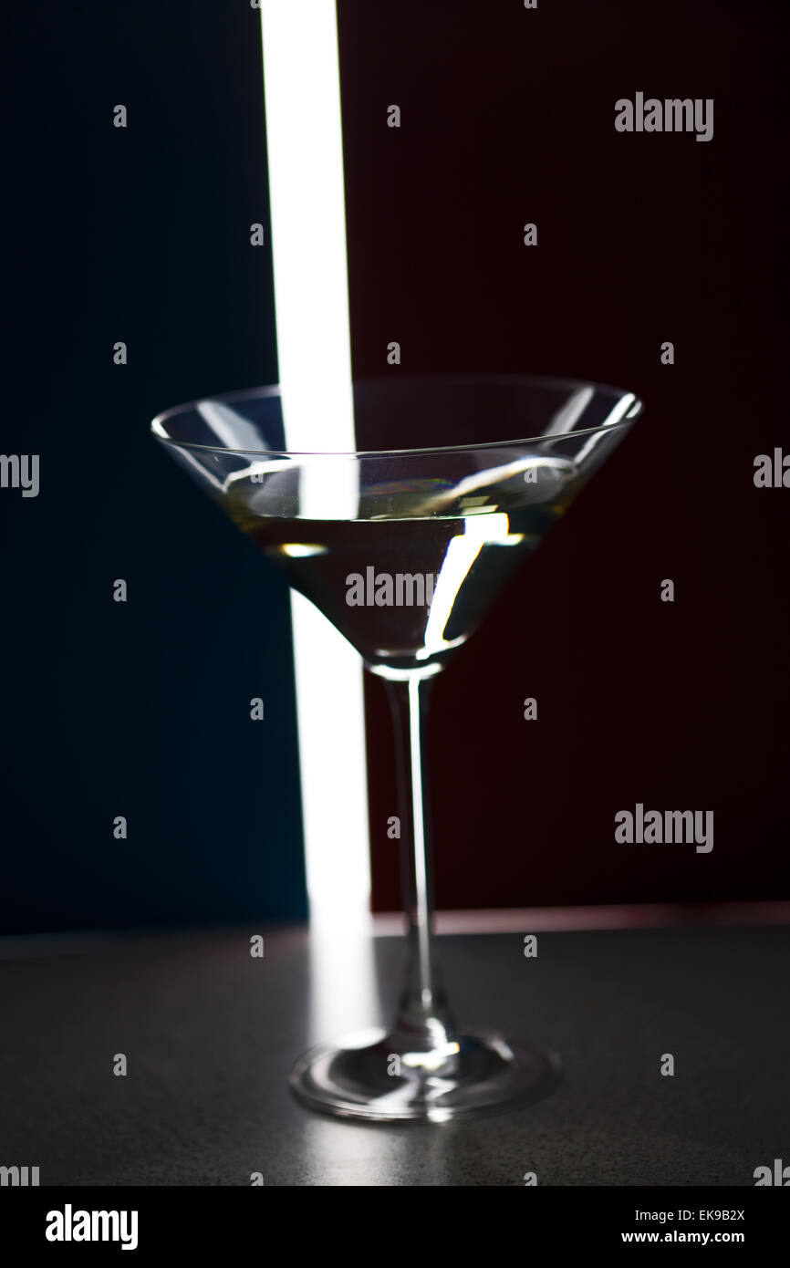 martini glass on a colored background Stock Photo - Alamy