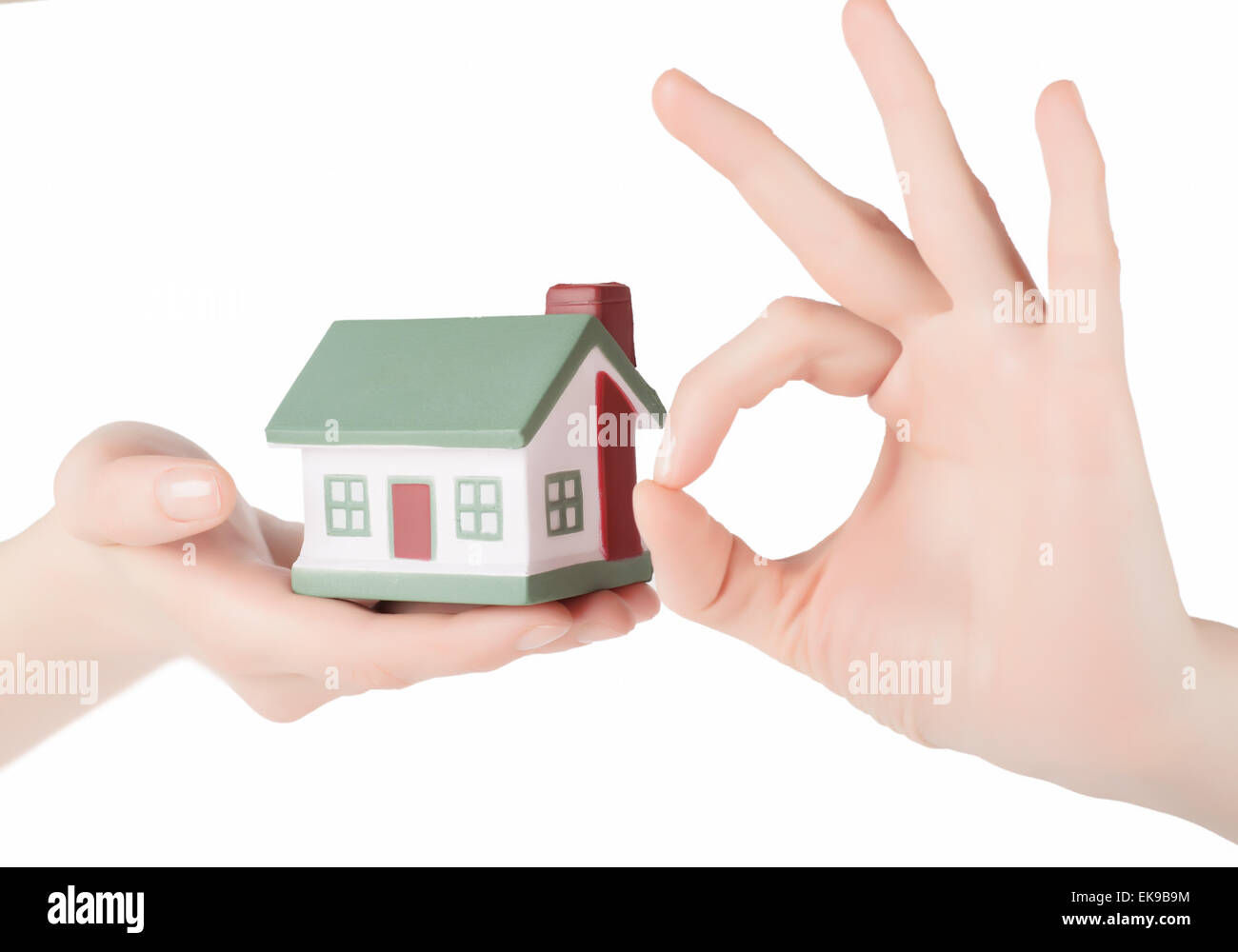 Hands over small house hi-res stock photography and images - Alamy