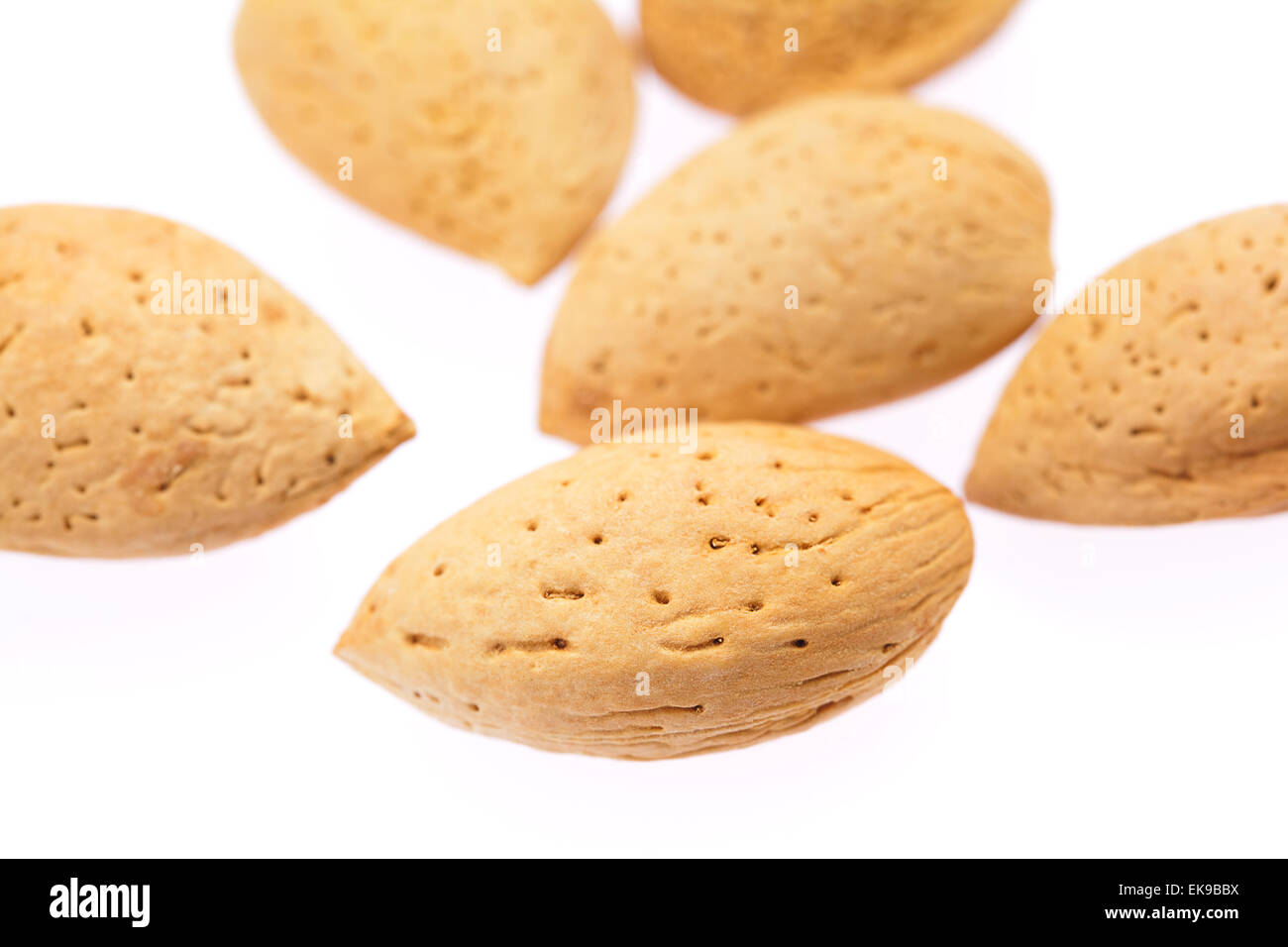 almonds isolated on white Stock Photo - Alamy