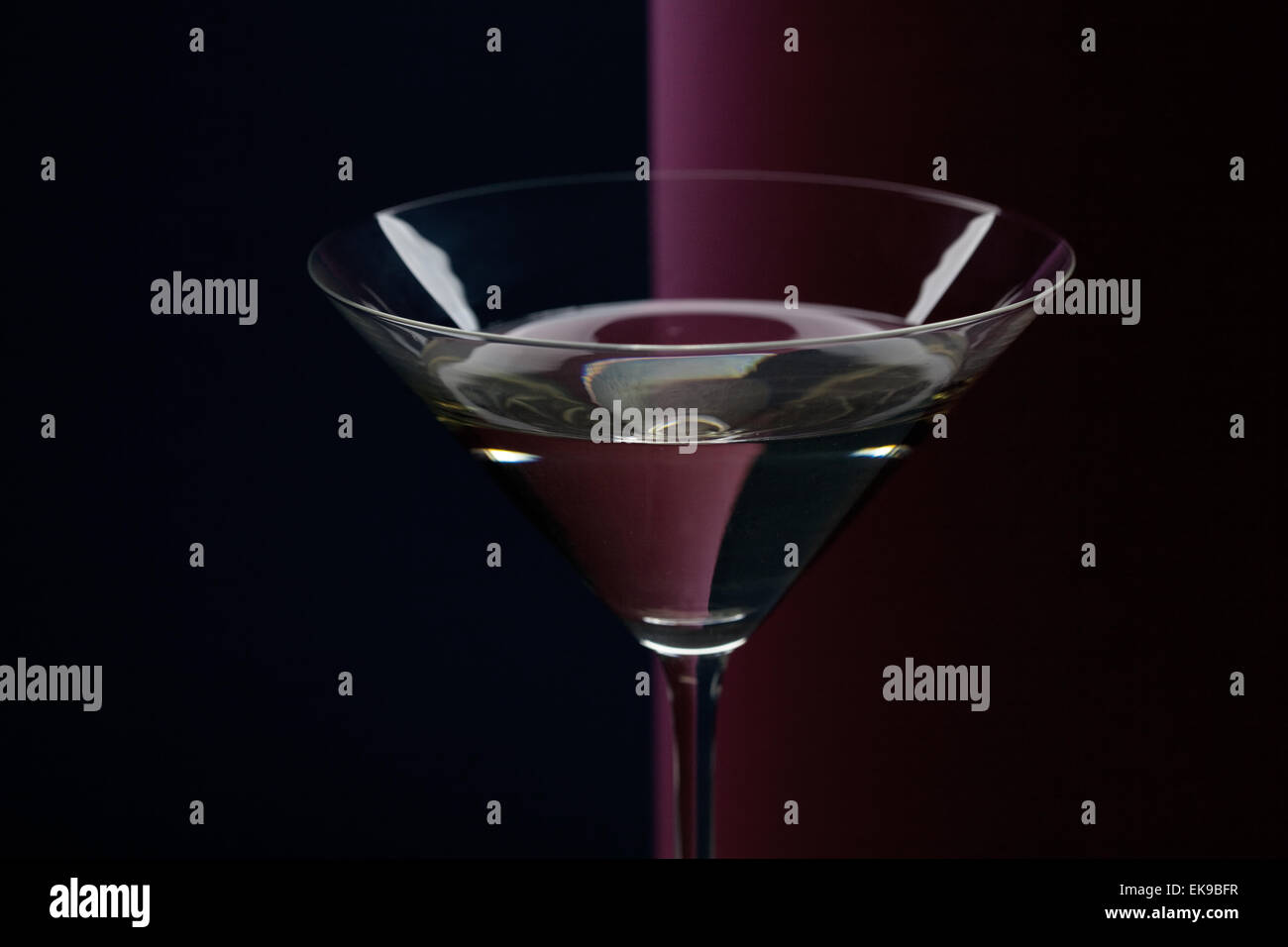 martini glass on a colored background Stock Photo - Alamy