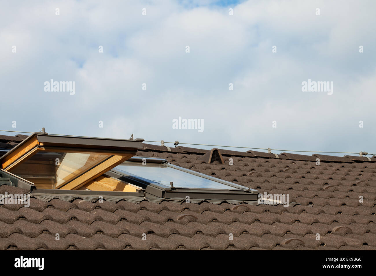 Tiled roof and dormer windows on the skyline Stock Photo - Alamy