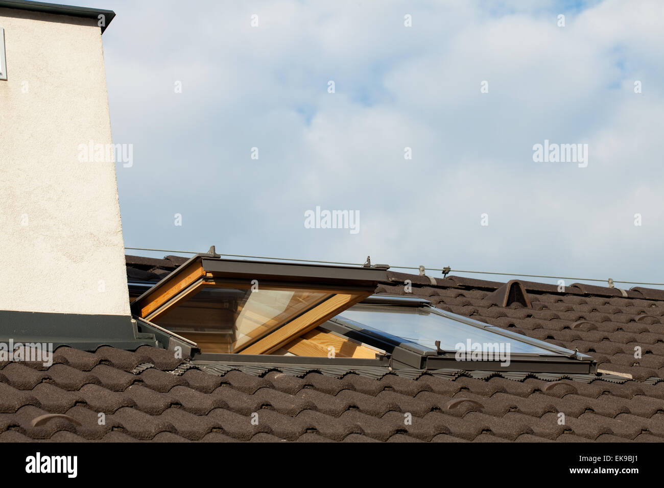 Tiled roof and dormer windows on the skyline Stock Photo - Alamy