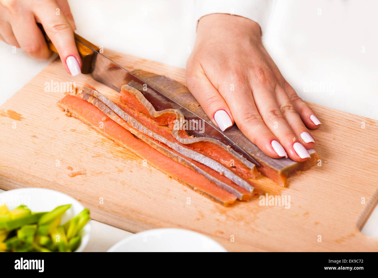 Cook cuts trout fish on hi-res stock photography and images - Alamy