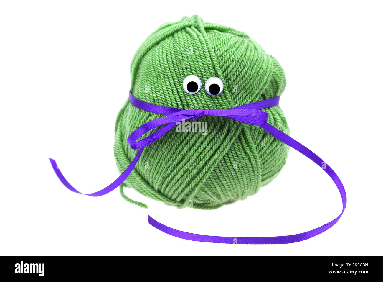 skein of wool with eyes and ribbon isolated on white Stock Photo - Alamy