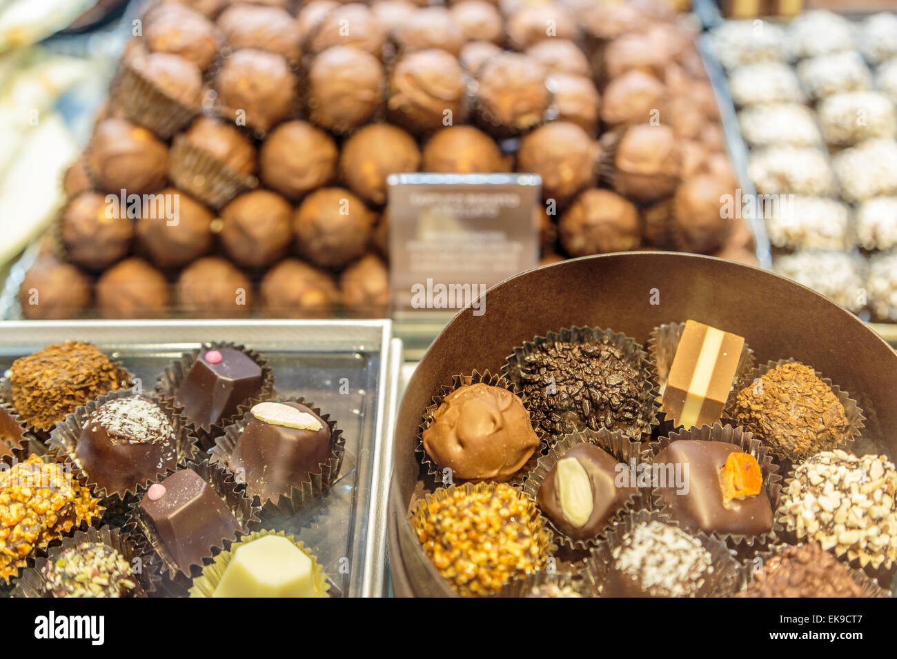 A chocolate display in a shop window front Stock Photo - Alamy